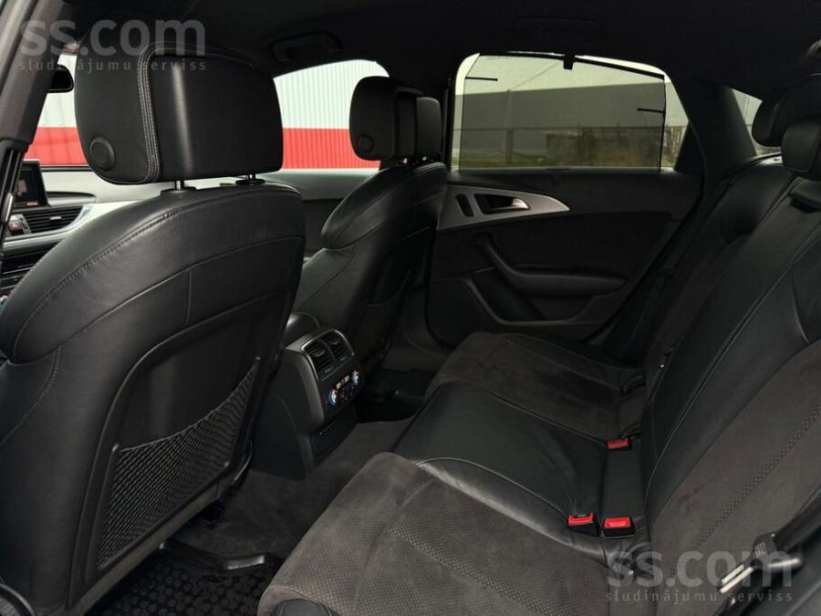 Black Audi A6 2011 in Riga, with an engine capacity of 3.00 L and mileage of 266 thousand km for 8990 €, photo 14 on AUTOMOTO.COM.LV