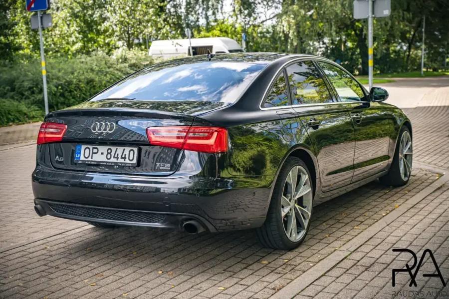 Black Audi A6 2011 in Riga, with an engine capacity of 3.00 L and mileage of 318 thousand km for 7990 €, photo 4 on AUTOMOTO.COM.LV