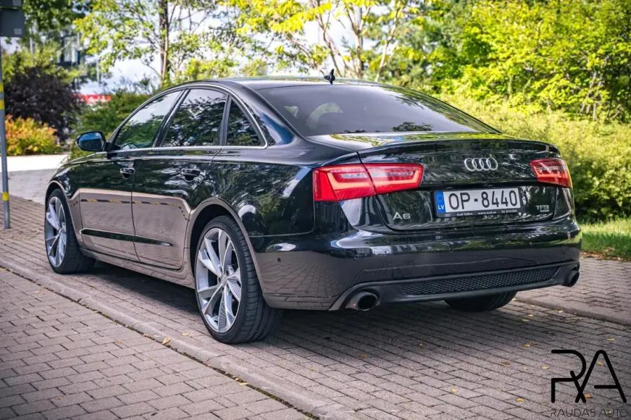 Black Audi A6 2011 in Riga, with an engine capacity of 3.00 L and mileage of 318 thousand km for 7990 €, photo 5 on AUTOMOTO.COM.LV