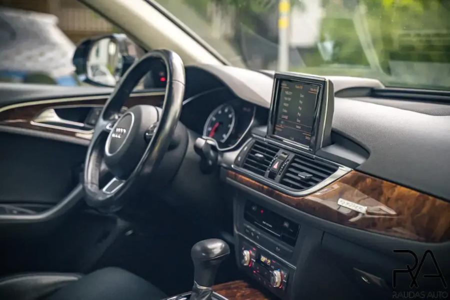 Black Audi A6 2011 in Riga, with an engine capacity of 3.00 L and mileage of 318 thousand km for 7990 €, photo 7 on AUTOMOTO.COM.LV