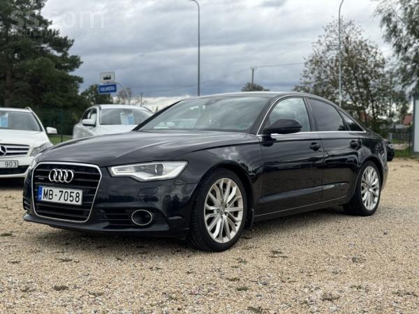 Black Audi A6 2011 in Valmiera, with an engine capacity of 3.00 L and mileage of 219 thousand km for 9750 €, photo 1 on AUTOMOTO.COM.LV