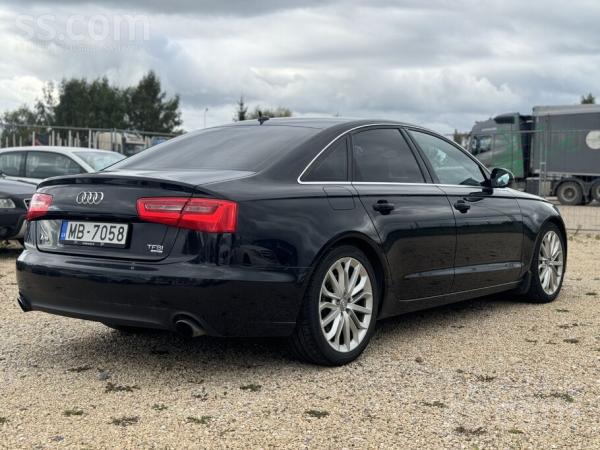 Black Audi A6 2011 in Valmiera, with an engine capacity of 3.00 L and mileage of 219 thousand km for 9750 €, photo 6 on AUTOMOTO.COM.LV