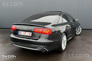 Black Audi A6 2012 in Jelgava, with an engine capacity of 3.00 L and mileage of 0 thousand km for 14250 €, photo 4 on AUTOMOTO.COM.LV