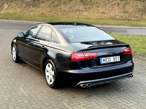 Black Audi A6 2012 in Vilnius, with an engine capacity of 3.00 L and mileage of 289 thousand km for 7700 €, photo 4 on AUTOMOTO.COM.LV
