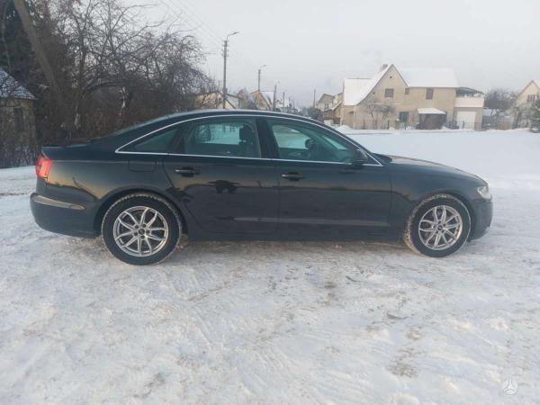 Black Audi A6 2012 in Panevezys, with an engine capacity of 1.97 L and mileage of 281 thousand km for 9200 €, photo 4 on AUTOMOTO.COM.LV