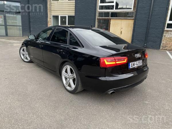 Black Audi A6 2012 in Riga, with an engine capacity of 3.00 L and mileage of 274 thousand km for 11258 €, photo 1 on AUTOMOTO.COM.LV