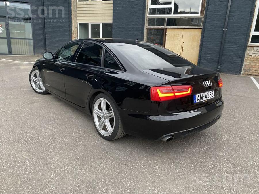 Black Audi A6 2012 in Riga, with an engine capacity of 3.00 L and mileage of 274 thousand km for 11258 €, photo 1 on AUTOMOTO.COM.LV