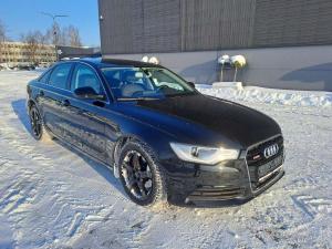 Black Audi A6 2012 in Siauliai, with an engine capacity of 2.00 L and mileage of 282 thousand km for 10300 €, photo 4 on AUTOMOTO.COM.LV