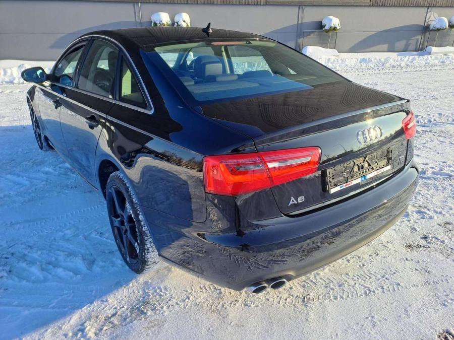 Black Audi A6 2012 in Siauliai, with an engine capacity of 2.00 L and mileage of 282 thousand km for 10300 €, photo 7 on AUTOMOTO.COM.LV