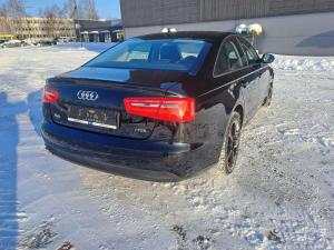 Black Audi A6 2012 in Siauliai, with an engine capacity of 2.00 L and mileage of 282 thousand km for 10300 €, photo 8 on AUTOMOTO.COM.LV