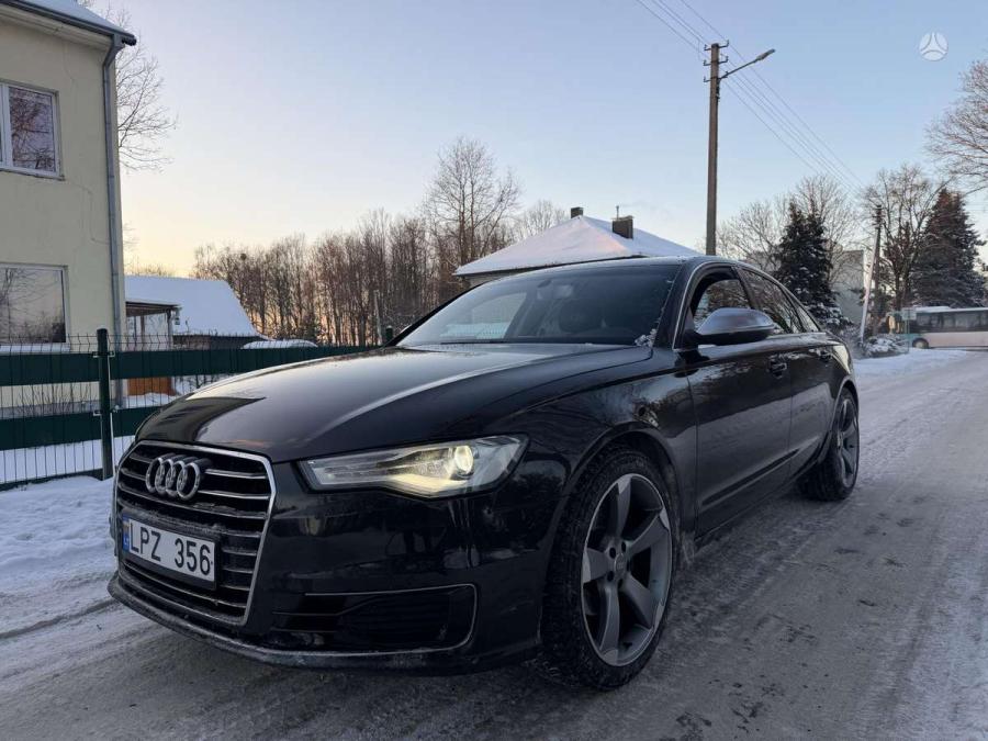 Black Audi A6 2012 in Kaunas, with an engine capacity of 2.77 L and mileage of 215 thousand km for 6650 €, photo 2 on AUTOMOTO.COM.LV