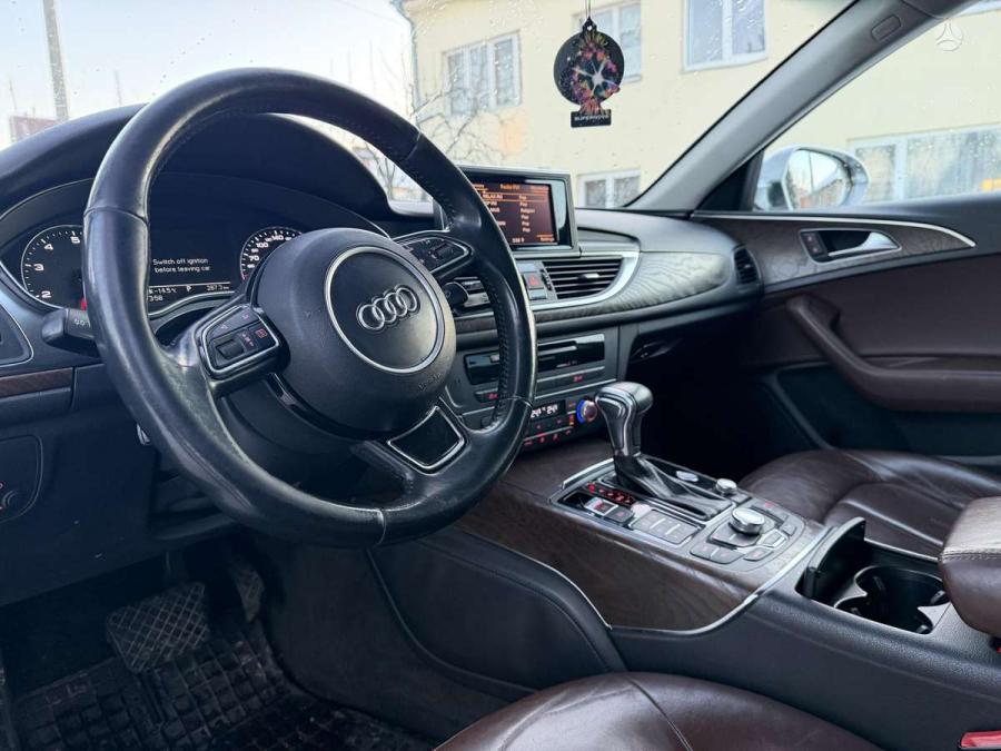 Black Audi A6 2012 in Kaunas, with an engine capacity of 2.77 L and mileage of 215 thousand km for 6650 €, photo 9 on AUTOMOTO.COM.LV