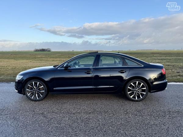 Black Audi A6 2012 in Vilkaviskis, with an engine capacity of 3.00 L and mileage of 281 thousand km for 11500 €, photo 5 on AUTOMOTO.COM.LV