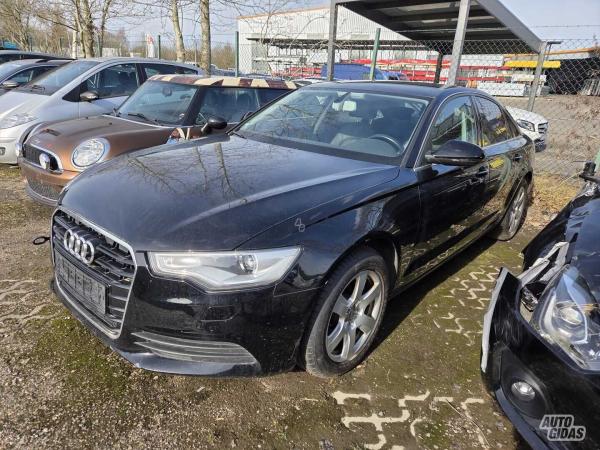 Black Audi A6 2012 in Kluonaliai, with an engine capacity of 3.00 L and mileage of 300 thousand km for 4499 €, photo 1 on AUTOMOTO.COM.LV