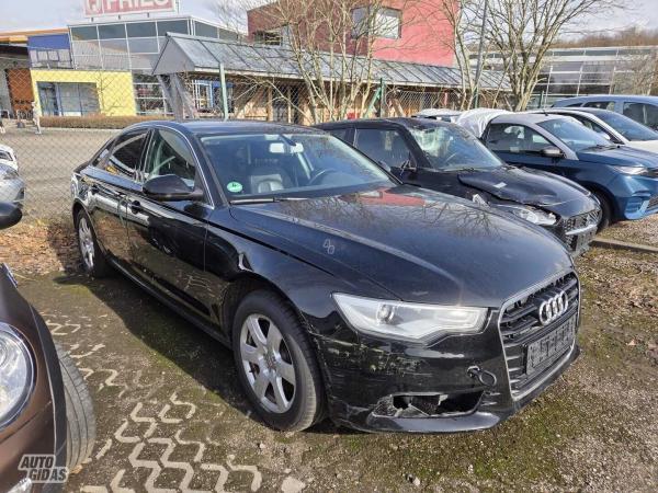 Black Audi A6 2012 in Kluonaliai, with an engine capacity of 3.00 L and mileage of 300 thousand km for 4499 €, photo 2 on AUTOMOTO.COM.LV
