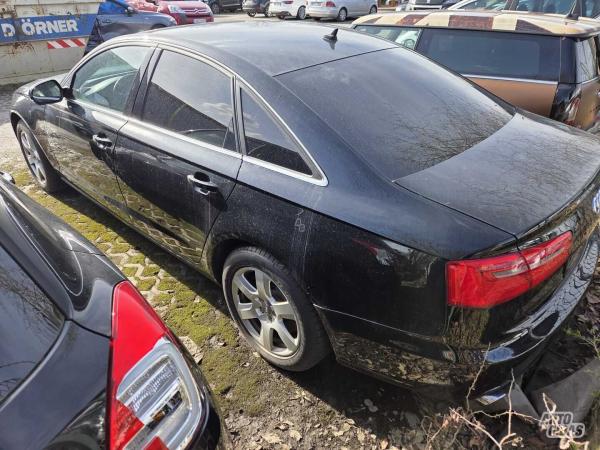 Black Audi A6 2012 in Kluonaliai, with an engine capacity of 3.00 L and mileage of 300 thousand km for 4499 €, photo 4 on AUTOMOTO.COM.LV