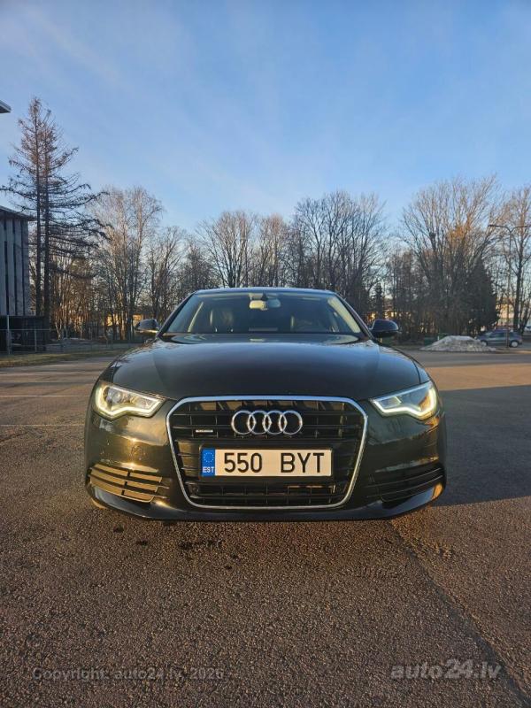 Black Audi A6 2012 in Johvi, with an engine capacity of 3.00 L and mileage of 302 thousand km for 14499 €, photo 1 on AUTOMOTO.COM.LV