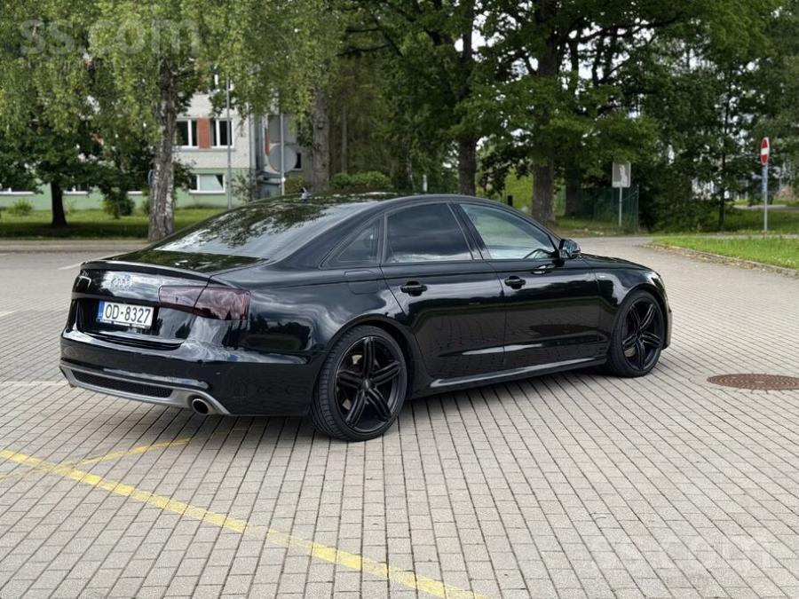 Black Audi A6 2012 in Jelgava, with an engine capacity of 3.00 L and mileage of 337 thousand km for 14300 €, photo 3 on AUTOMOTO.COM.LV
