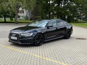 Black Audi A6 2012 in Jelgava, with an engine capacity of 3.00 L and mileage of 337 thousand km for 14300 €, photo 4 on AUTOMOTO.COM.LV