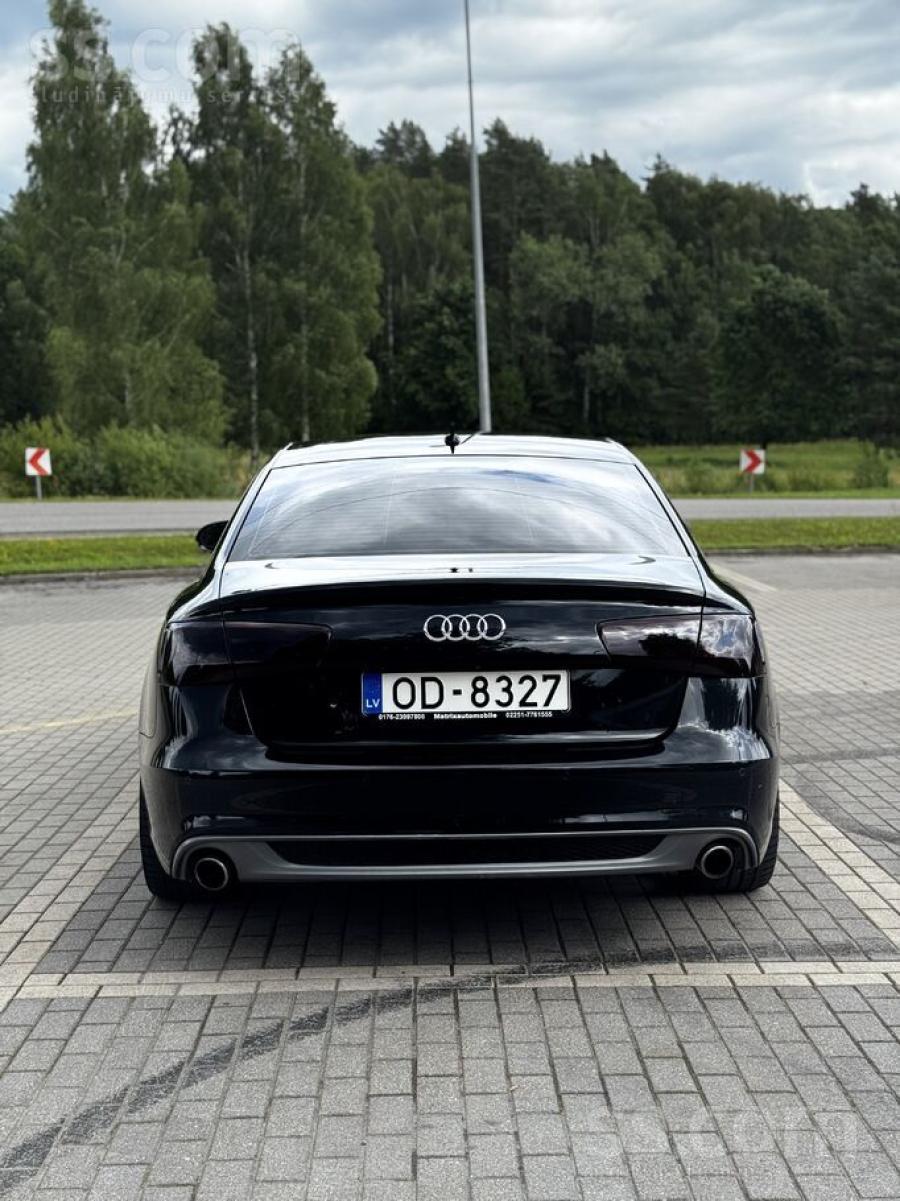 Black Audi A6 2012 in Jelgava, with an engine capacity of 3.00 L and mileage of 337 thousand km for 14300 €, photo 5 on AUTOMOTO.COM.LV