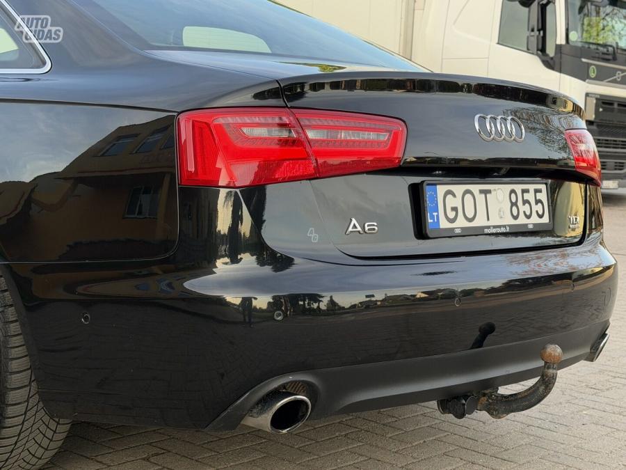 Black Audi A6 2012 in Kaisiadorys, with an engine capacity of 3.00 L and mileage of 310 thousand km for 8300 €, photo 12 on AUTOMOTO.COM.LV