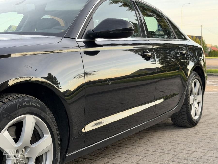 Black Audi A6 2012 in Kaisiadorys, with an engine capacity of 3.00 L and mileage of 310 thousand km for 8300 €, photo 15 on AUTOMOTO.COM.LV