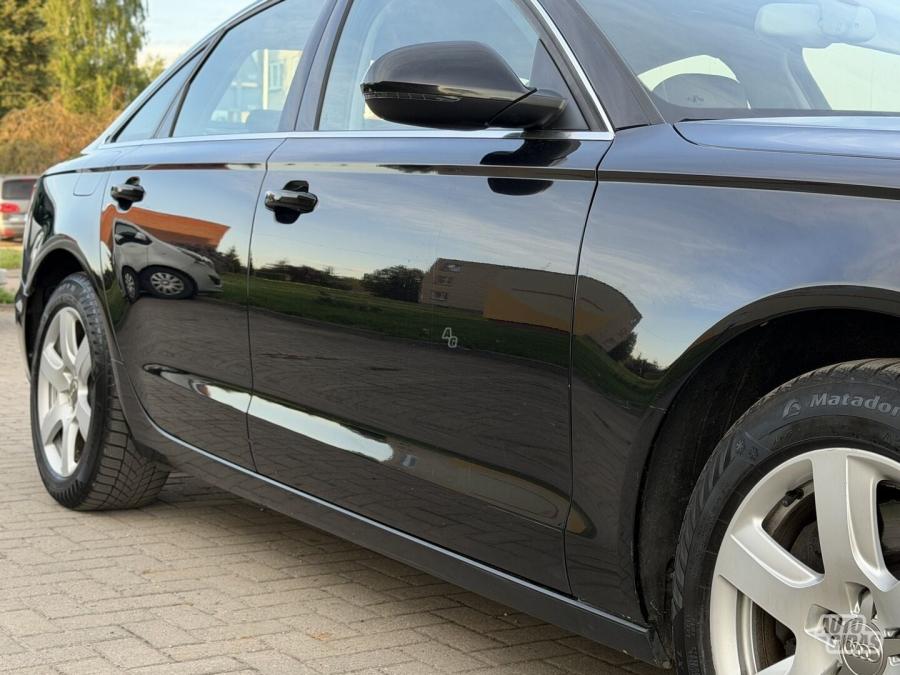Black Audi A6 2012 in Kaisiadorys, with an engine capacity of 3.00 L and mileage of 310 thousand km for 8300 €, photo 16 on AUTOMOTO.COM.LV