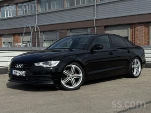Melns Audi A6 2012 Rīga, ar dzinēja tilpumu 3.00 L un nobraukumu 277 tūkst. km par 9990 €, foto  vietnē AUTOMOTO.COM.LV