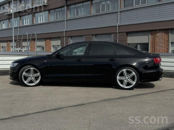 Black Audi A6 2012 in Riga, with an engine capacity of 3.00 L and mileage of 277 thousand km for 9990 €, photo 2 on AUTOMOTO.COM.LV
