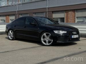 Black Audi A6 2012 in Riga, with an engine capacity of 3.00 L and mileage of 277 thousand km for 9990 €, photo 4 on AUTOMOTO.COM.LV