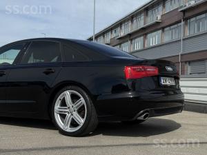 Black Audi A6 2012 in Riga, with an engine capacity of 3.00 L and mileage of 277 thousand km for 9990 €, photo 6 on AUTOMOTO.COM.LV