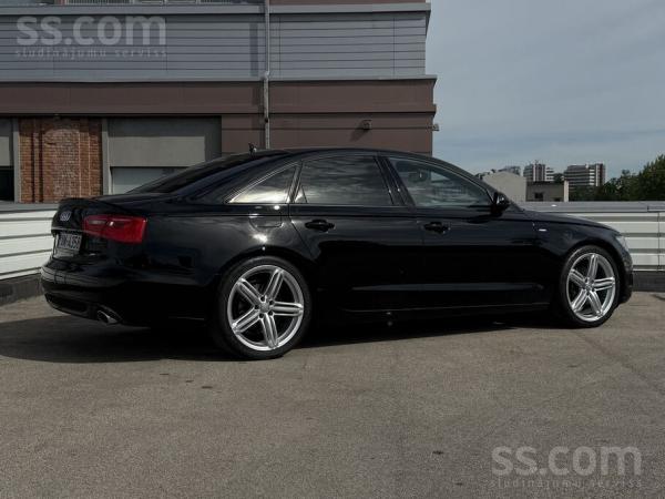 Black Audi A6 2012 in Riga, with an engine capacity of 3.00 L and mileage of 277 thousand km for 9990 €, photo 8 on AUTOMOTO.COM.LV