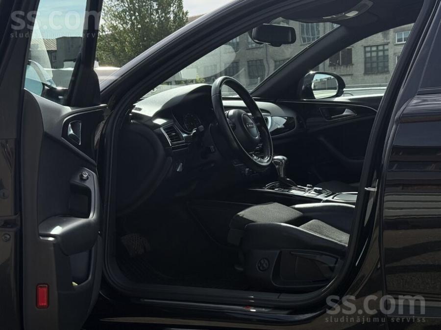 Black Audi A6 2012 in Riga, with an engine capacity of 3.00 L and mileage of 277 thousand km for 9990 €, photo 13 on AUTOMOTO.COM.LV