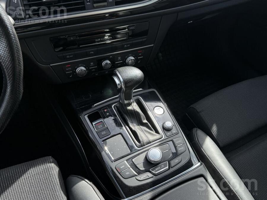 Black Audi A6 2012 in Riga, with an engine capacity of 3.00 L and mileage of 277 thousand km for 9990 €, photo 15 on AUTOMOTO.COM.LV