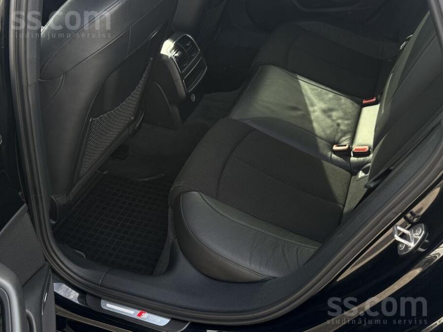 Black Audi A6 2012 in Riga, with an engine capacity of 3.00 L and mileage of 277 thousand km for 9990 €, photo 17 on AUTOMOTO.COM.LV