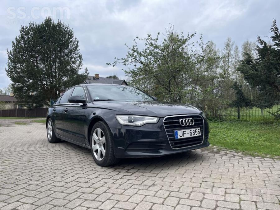 Black Audi A6 2012 in Riga, with an engine capacity of 3.00 L and mileage of 302 thousand km for 10500 €, photo 1 on AUTOMOTO.COM.LV