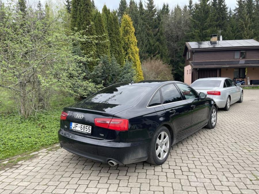 Black Audi A6 2012 in Riga, with an engine capacity of 3.00 L and mileage of 302 thousand km for 10500 €, photo 4 on AUTOMOTO.COM.LV