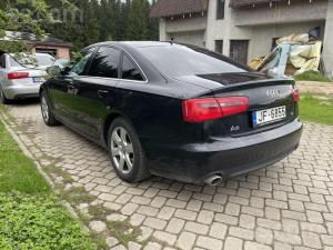 Black Audi A6 2012 in Riga, with an engine capacity of 3.00 L and mileage of 302 thousand km for 10500 €, photo 5 on AUTOMOTO.COM.LV