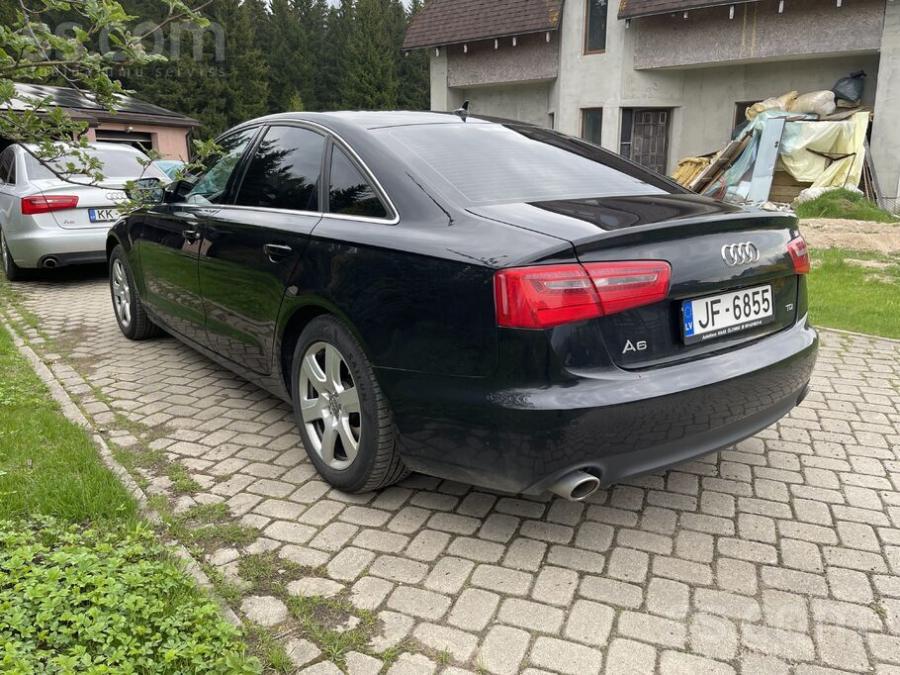 Black Audi A6 2012 in Riga, with an engine capacity of 3.00 L and mileage of 302 thousand km for 10500 €, photo 5 on AUTOMOTO.COM.LV