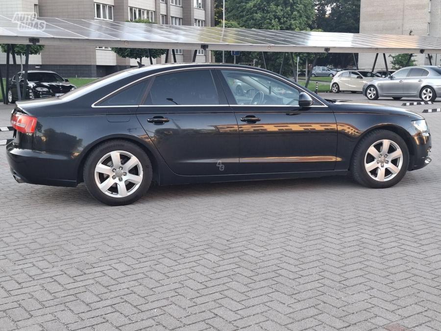 Black Audi A6 2012 in Silute, with an engine capacity of 2.80 L and mileage of 208 thousand km for 7400 €, photo 6 on AUTOMOTO.COM.LV