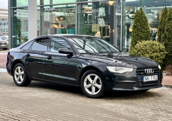 Black Audi A6 2012 in Riga, with an engine capacity of 3.00 L and mileage of 212 thousand km for 13200 €, photo 1 on AUTOMOTO.COM.LV