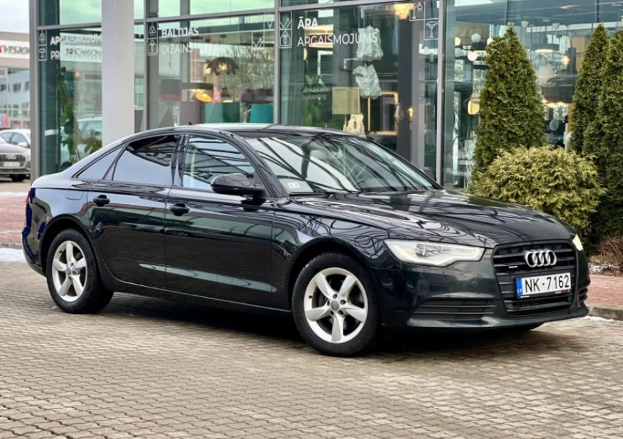 Black Audi A6 2012 in Riga, with an engine capacity of 3.00 L and mileage of 212 thousand km for 13200 €, photo 1 on AUTOMOTO.COM.LV