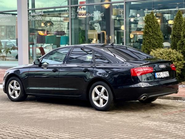 Black Audi A6 2012 in Riga, with an engine capacity of 3.00 L and mileage of 212 thousand km for 13200 €, photo 4 on AUTOMOTO.COM.LV