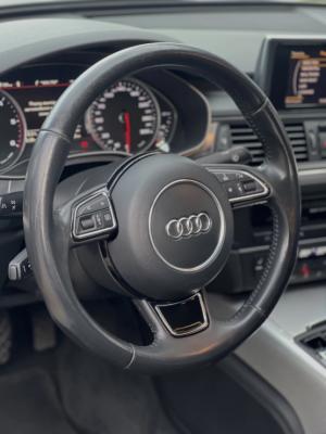Black Audi A6 2012 in Riga, with an engine capacity of 3.00 L and mileage of 212 thousand km for 13200 €, photo 12 on AUTOMOTO.COM.LV