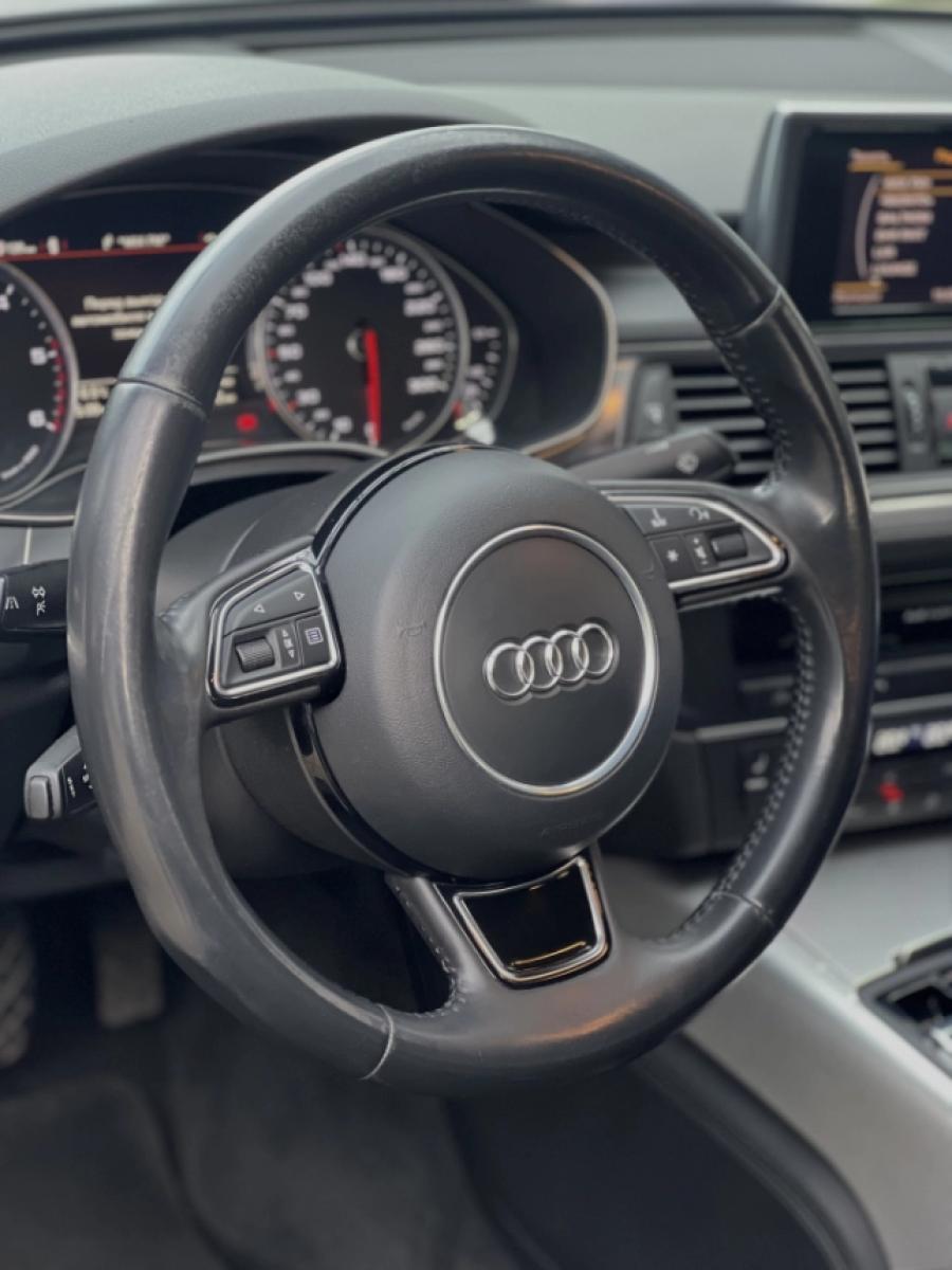 Black Audi A6 2012 in Riga, with an engine capacity of 3.00 L and mileage of 212 thousand km for 13200 €, photo 12 on AUTOMOTO.COM.LV