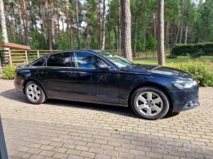 Black Audi A6 2012 in Riga, with an engine capacity of 3.00 L and mileage of 170 thousand km for 9990 €, photo 5 on AUTOMOTO.COM.LV