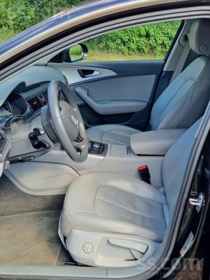 Black Audi A6 2012 in Riga, with an engine capacity of 3.00 L and mileage of 170 thousand km for 9990 €, photo 7 on AUTOMOTO.COM.LV