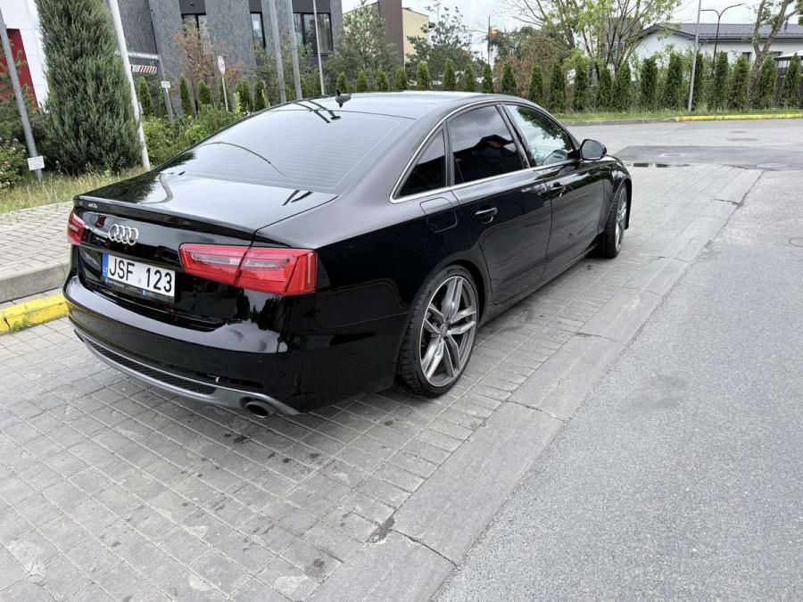 Black Audi A6 2012 in Vilnius, with an engine capacity of 3.00 L and mileage of 209 thousand km for 9999 €, photo 5 on AUTOMOTO.COM.LV