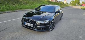 Black Audi A6 2012 in Jonava, with an engine capacity of 2.97 L and mileage of 290 thousand km for 7199 €, photo 3 on AUTOMOTO.COM.LV