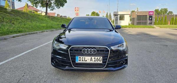 Black Audi A6 2012 in Jonava, with an engine capacity of 2.97 L and mileage of 290 thousand km for 7199 €, photo 4 on AUTOMOTO.COM.LV